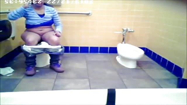 Gal On The Toilet Talks On The Phone